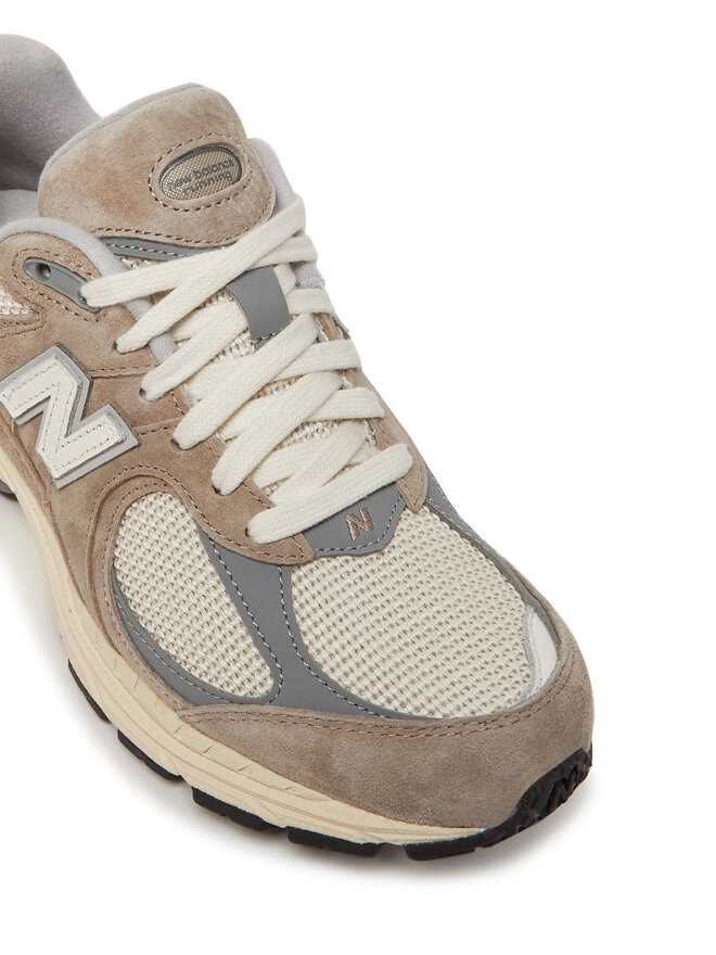 Sneakers New Balance U2002RRD Beige | eschuhe.de
